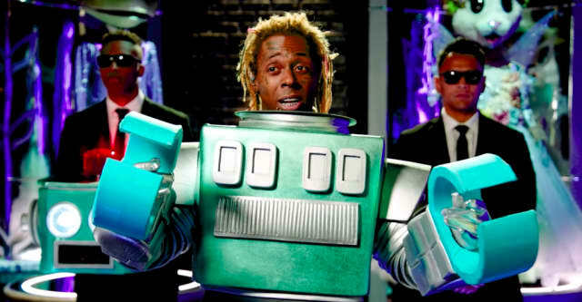 Lil Wayne Revealed as Robot on Fox's 'The Masked Singer' [WATCH ...